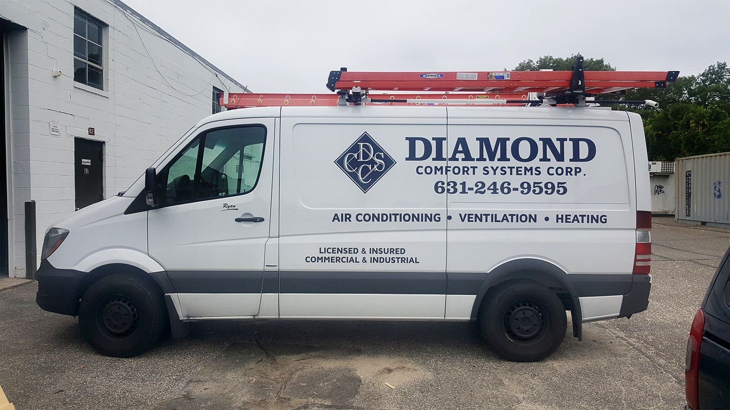 Vinyl lettering on a fleet of vans | Sign Company Long Island NY